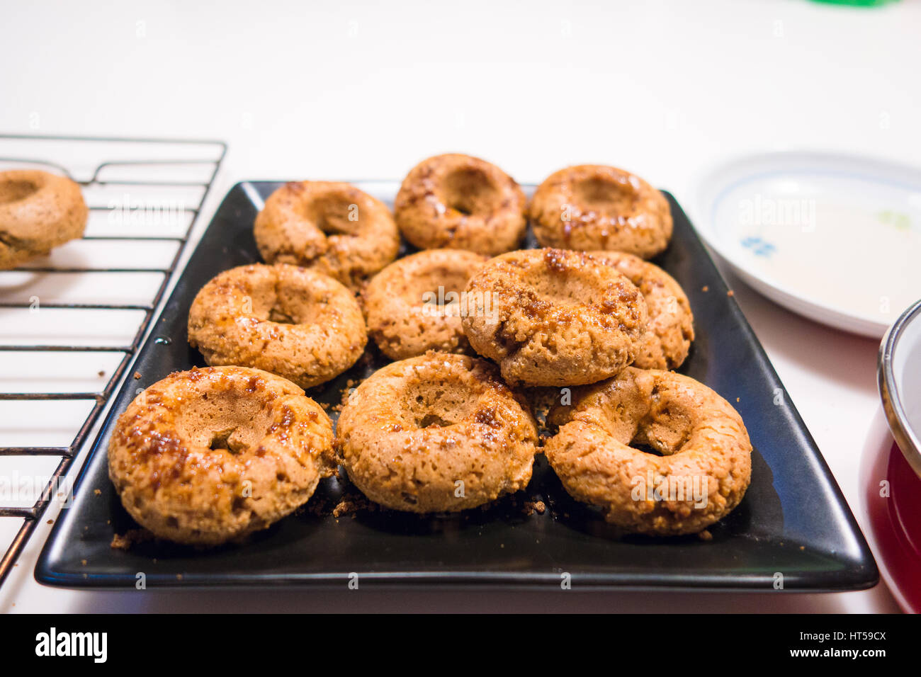 Side view of cinnamon donuts Stock Photo - Alamy
