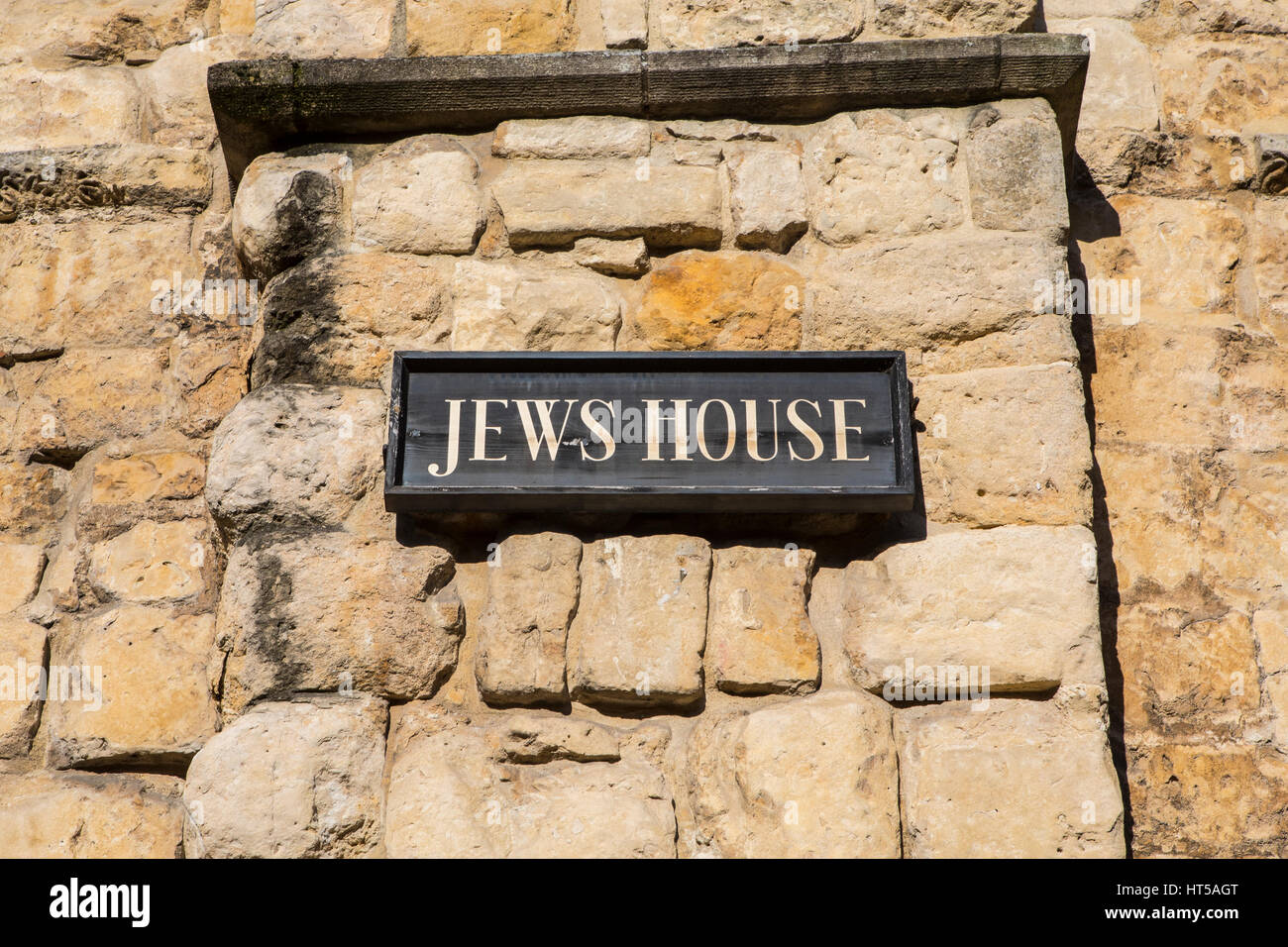The plaque on the exterior of the historic Jews House in the city of ...