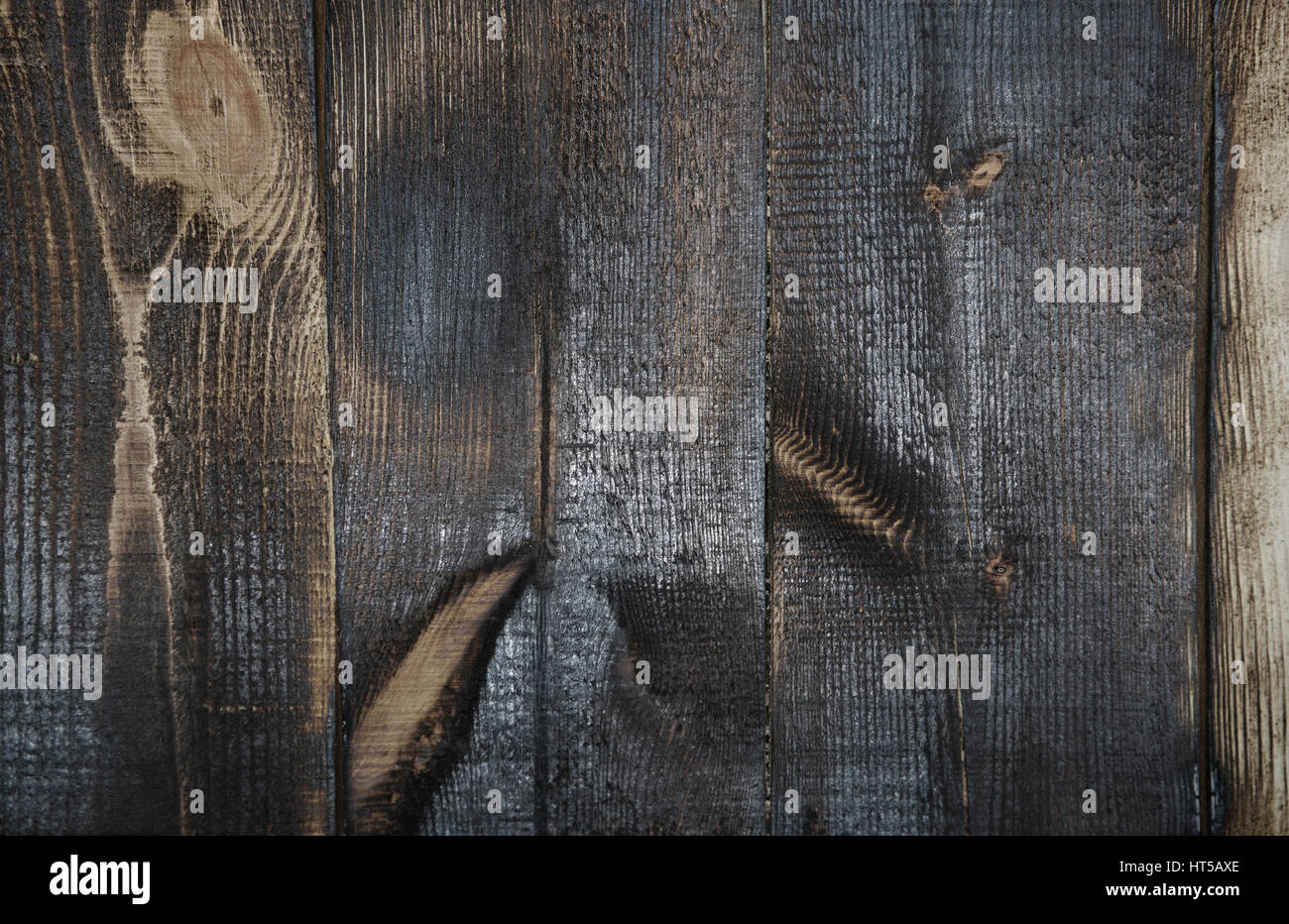 Burnt out wooden plans. Full frame photo Stock Photo - Alamy