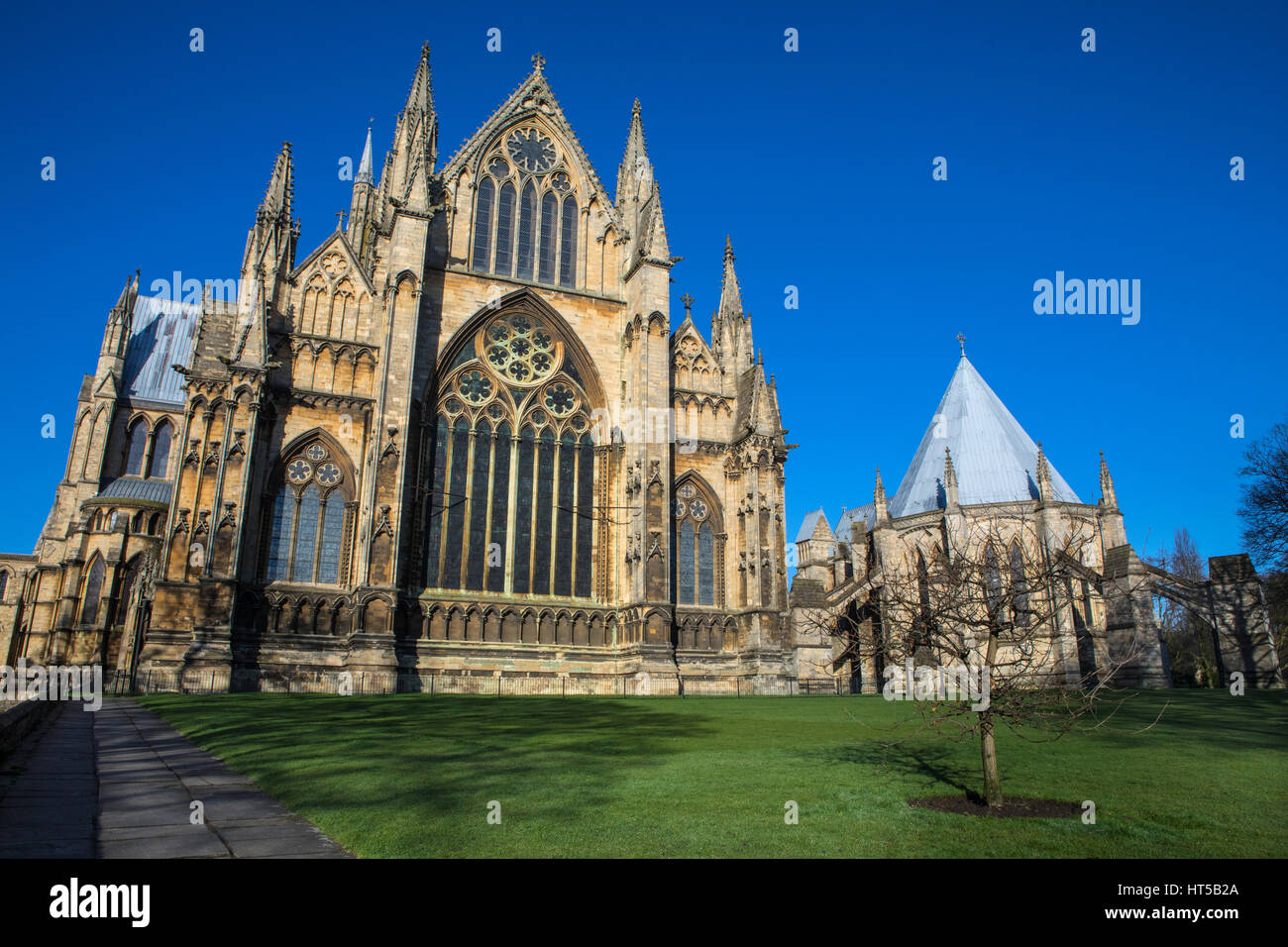 A view of the eastern facade of Lincoln Cathedral and the Chapter House ...