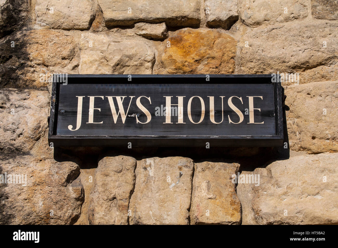 The plaque on the exterior of the historic Jews House in the city of ...