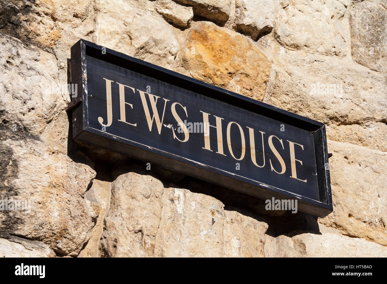 The plaque on the exterior of the historic Jews House in the city of ...