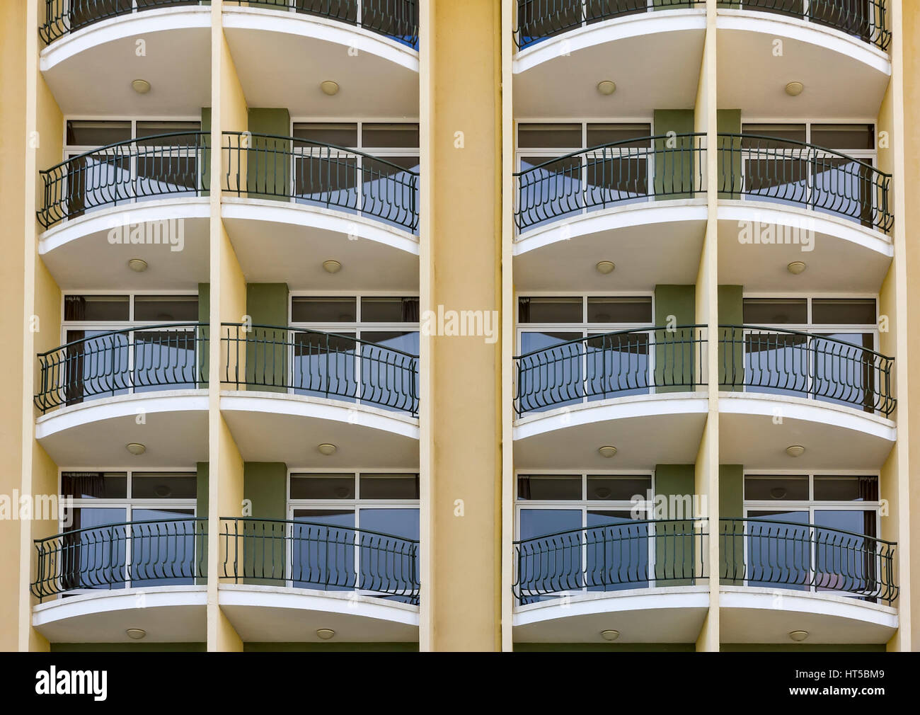 repeating pattern of windows and balcony Stock Photo - Alamy