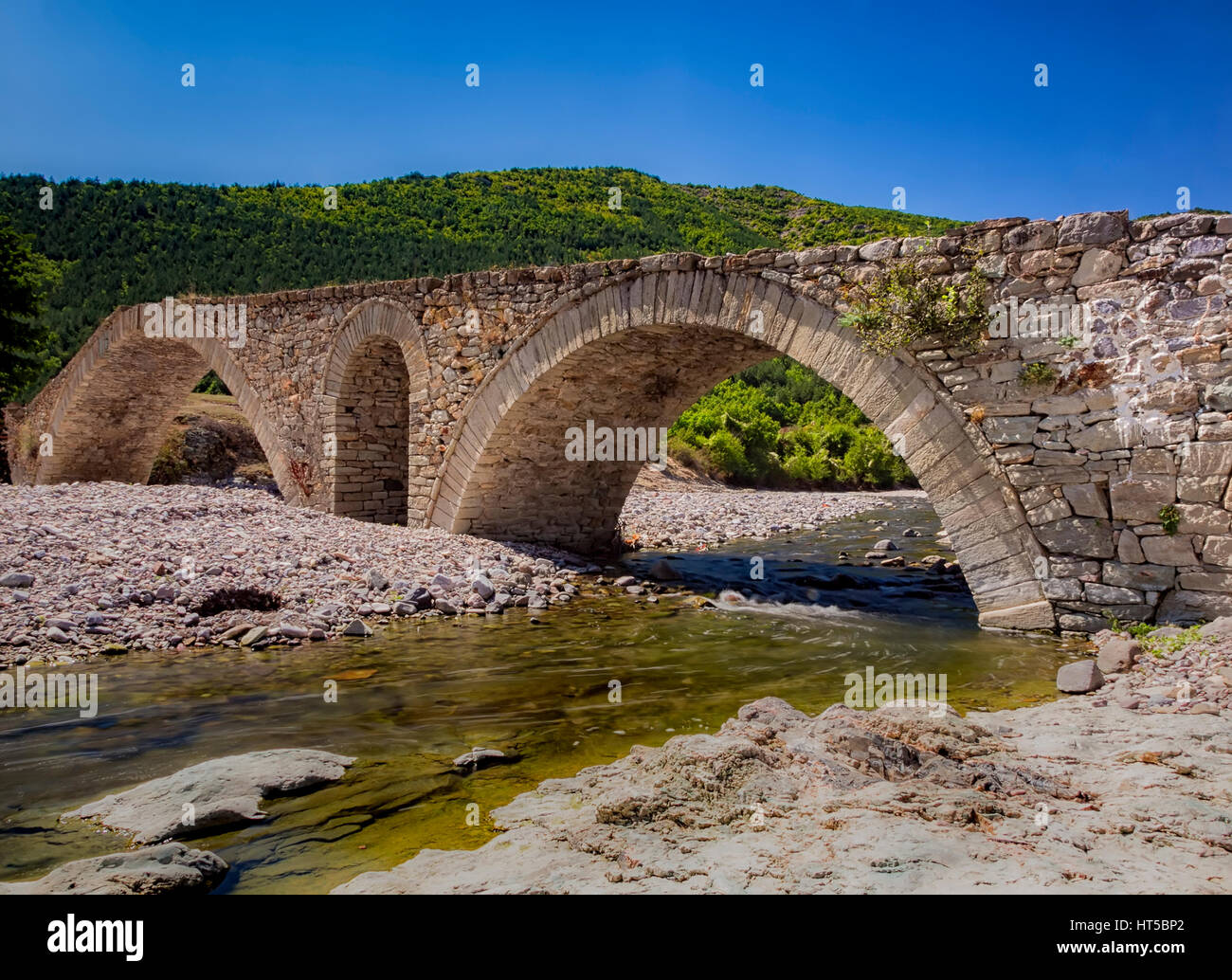 day view of old Roman stone bridge near village Nenkovo. Bulgaria Stock ...