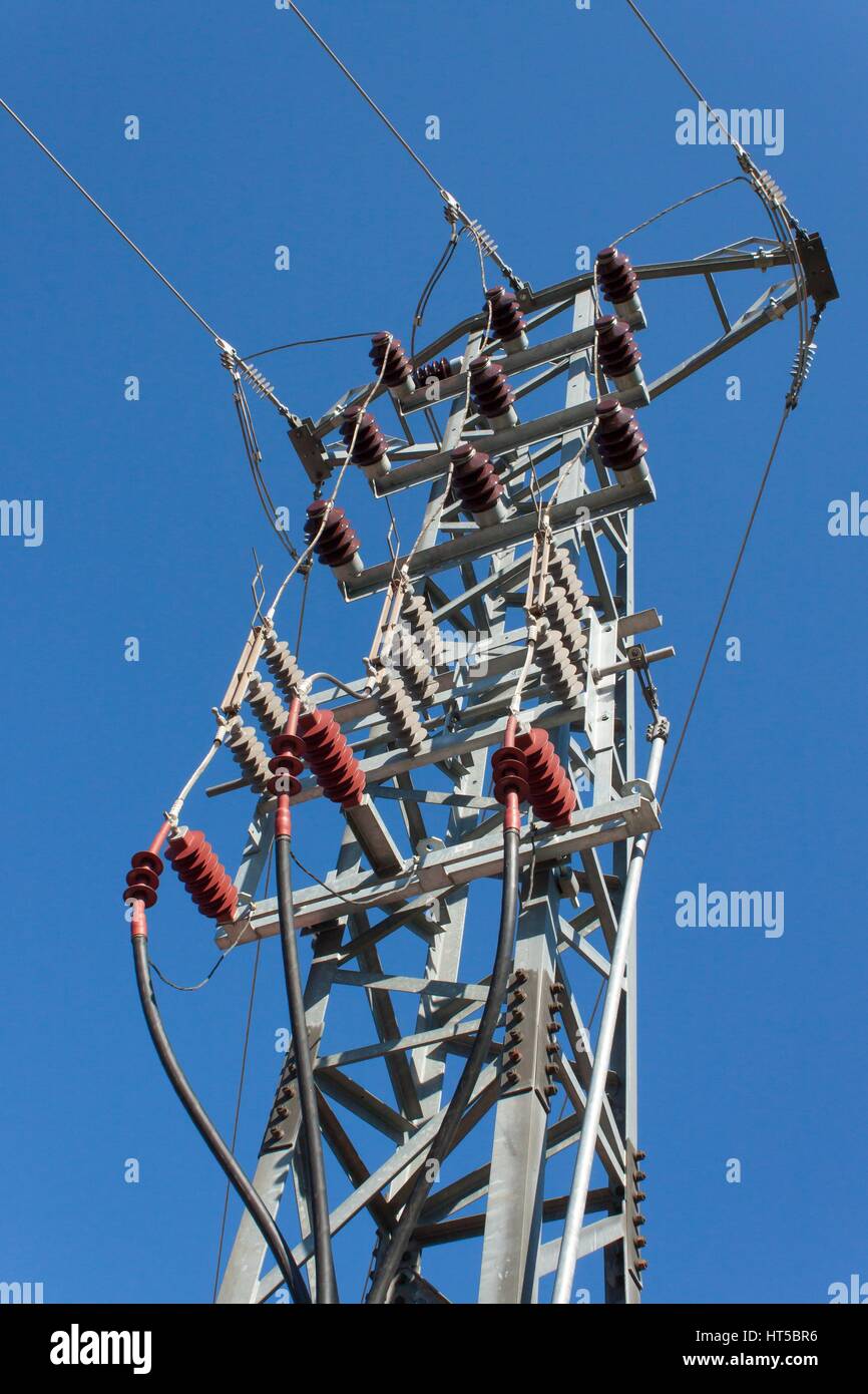 Distribution of electrical energy. Columns high voltage power lines ...