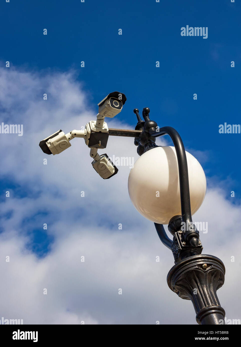 Cctv camera on lamp hi-res stock photography and images - Alamy