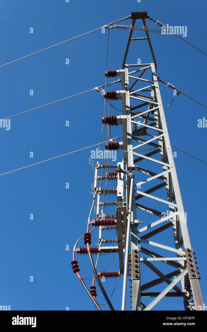 Distribution of electrical energy. Columns high voltage power lines ...