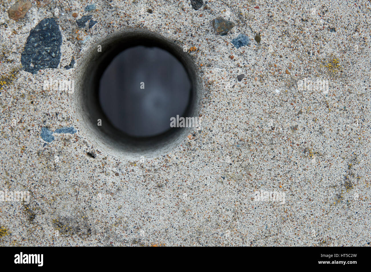 Hole in a concrete fence Stock Photo - Alamy