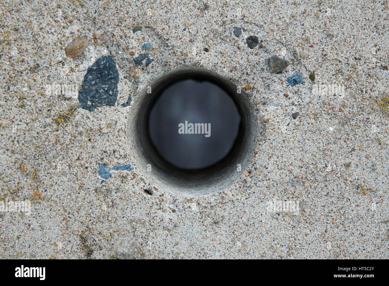 Hole in a concrete fence Stock Photo - Alamy