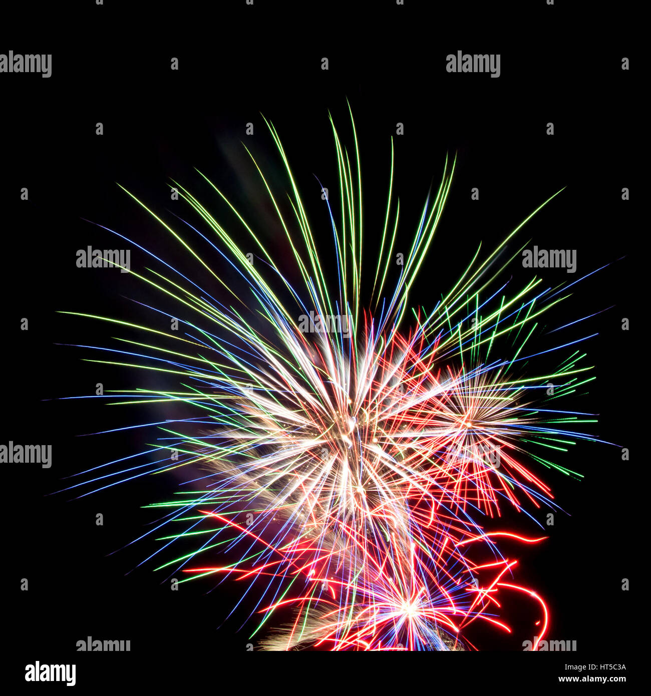multicolor fireworks on black background Stock Photo - Alamy