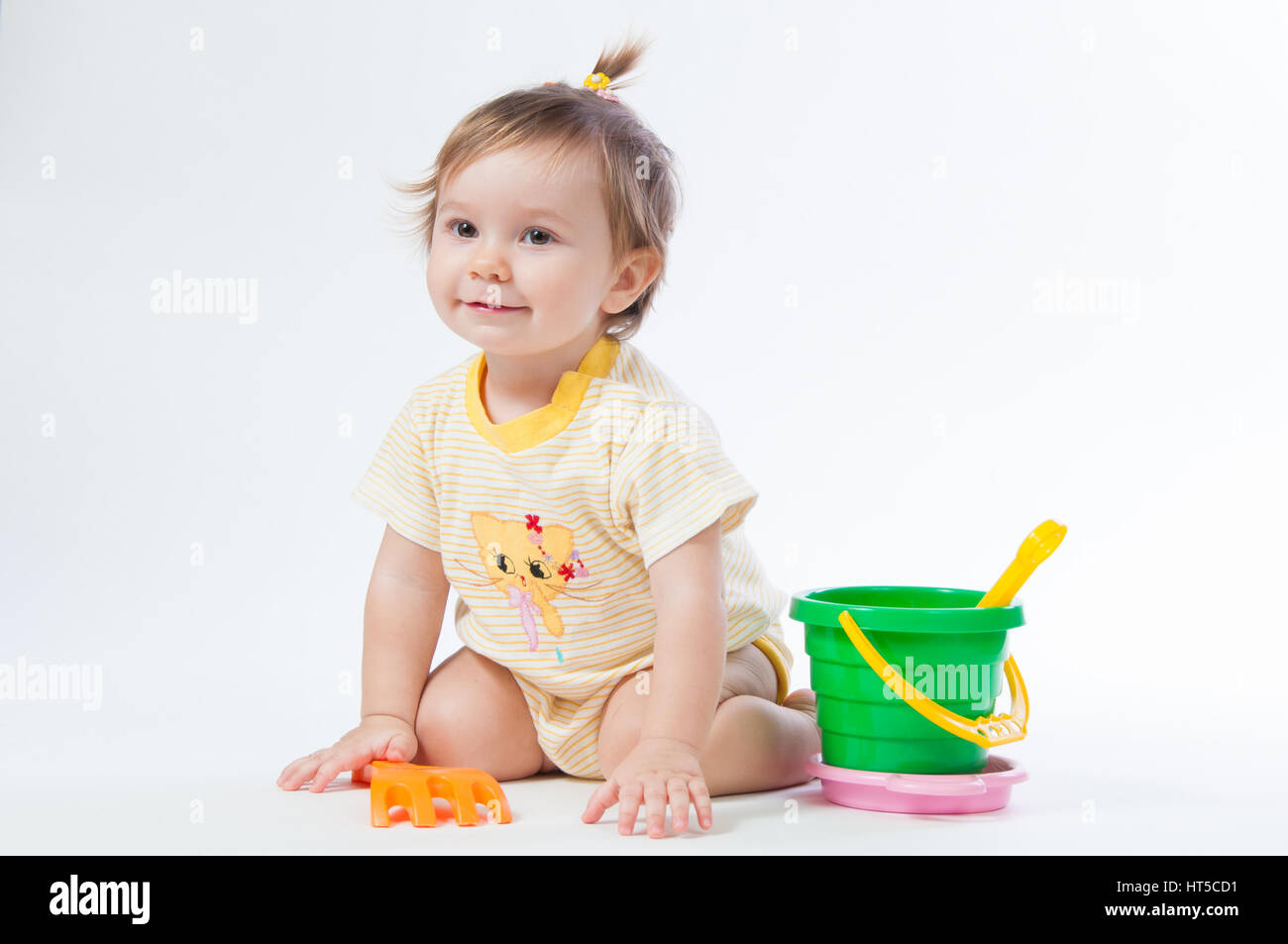 Cute baby with bucket and spade isolated on white background Stock ...