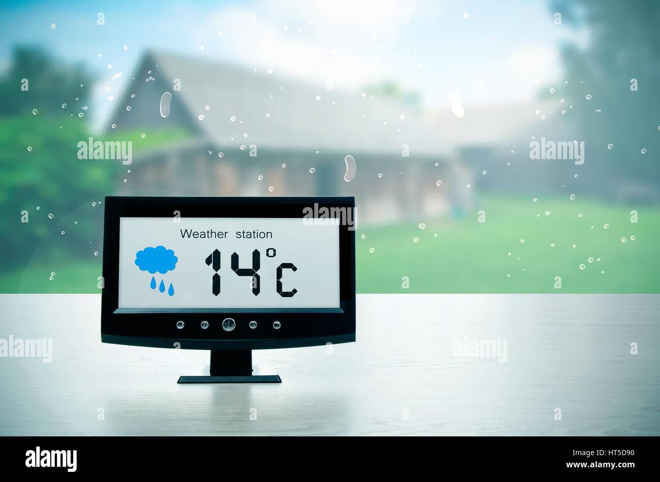 Weather station device with weather conditions outside background Stock ...