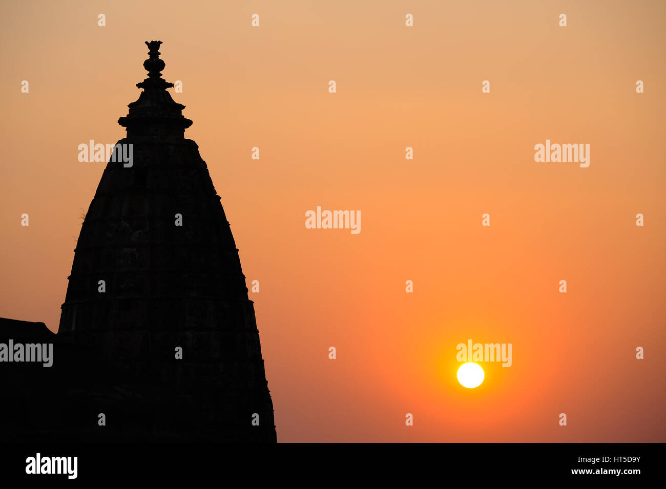 Radhika Raman temple silhouetted at sunset Stock Photo - Alamy