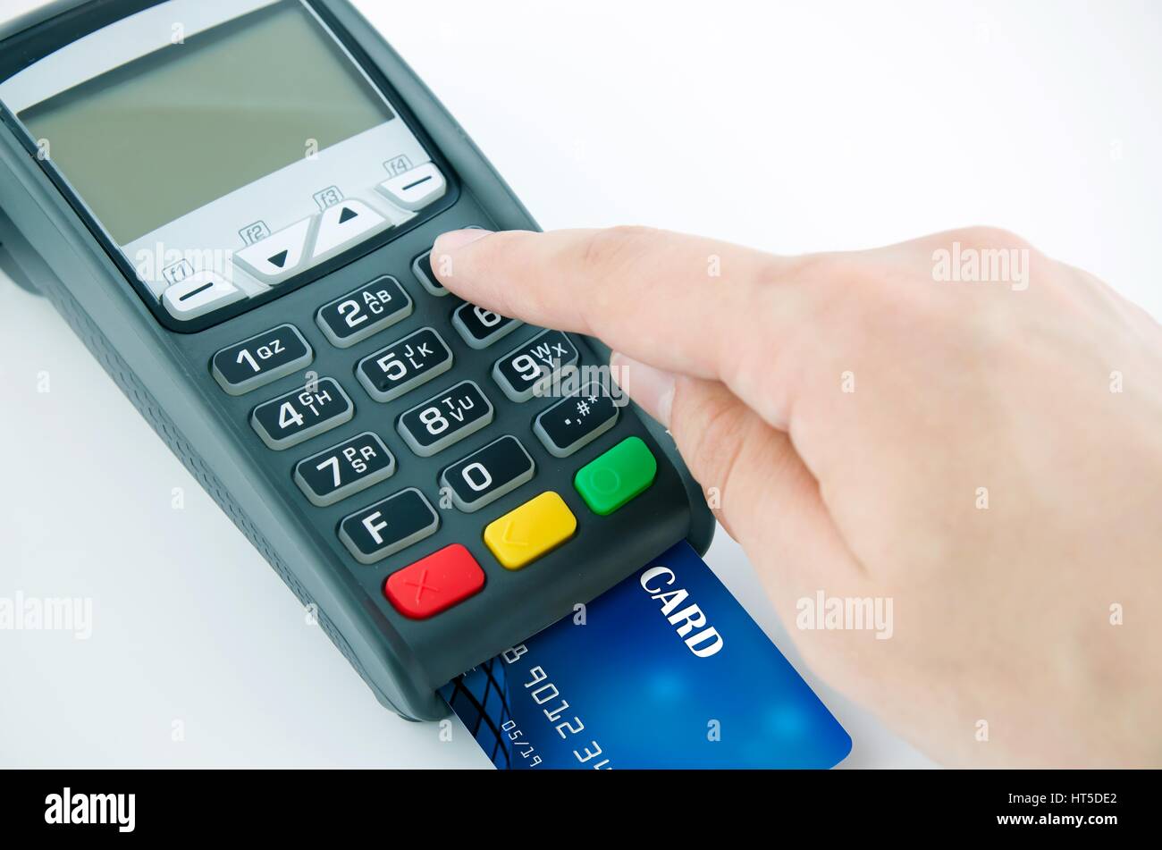 Man using payment terminal keypad, enter personal identyfication number ...