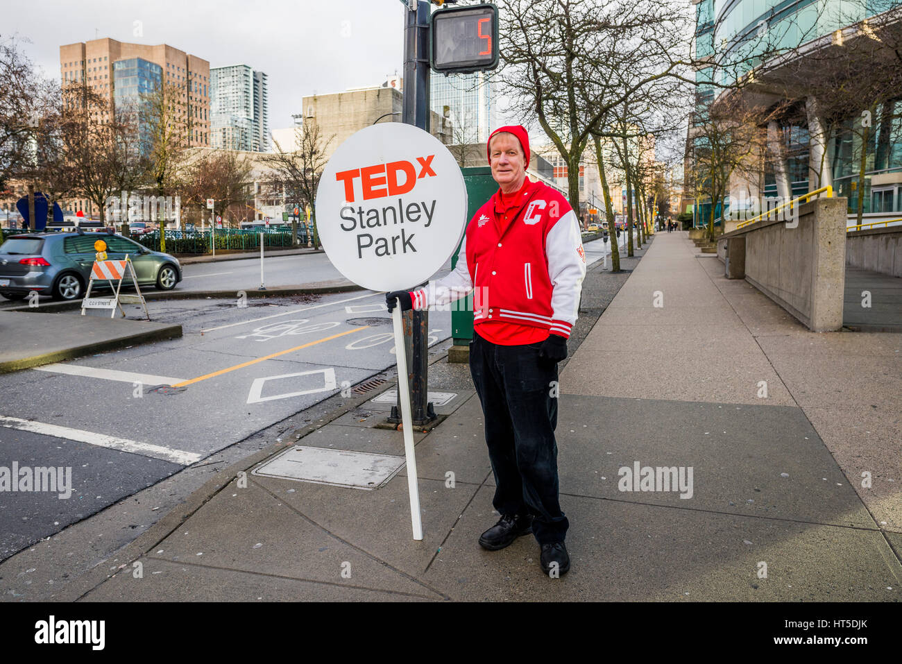 Man with lollipop sign advertising TedTalks Ted X Conference, Vancouver ...