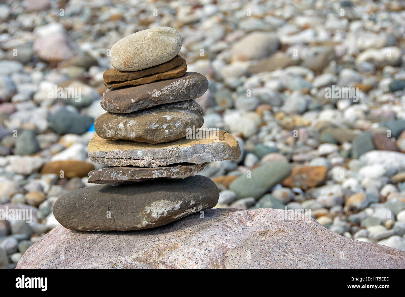 cairn of stones balancing on boulder Stock Photo - Alamy