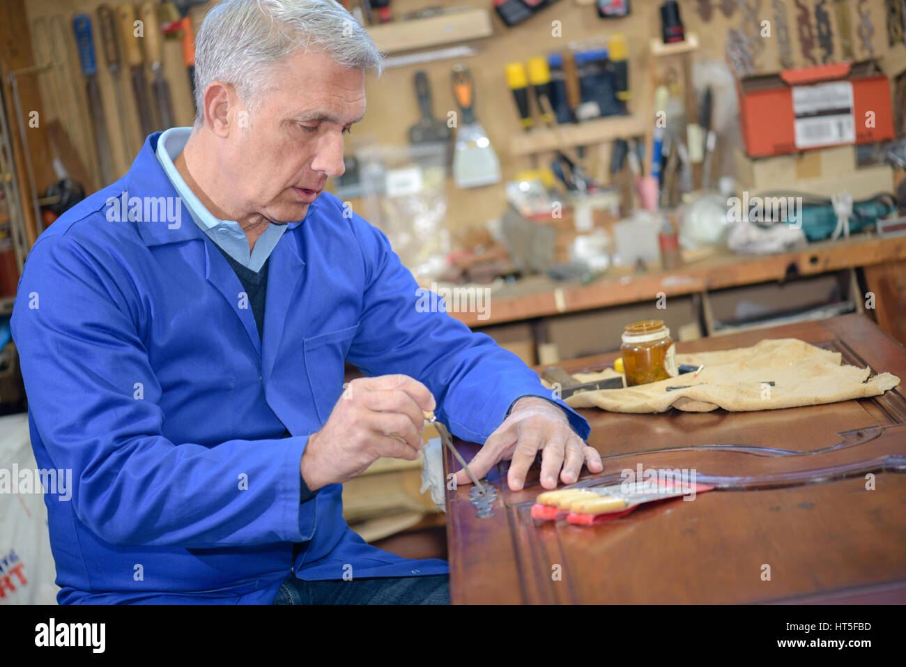 Man engraving wood hi-res stock photography and images - Alamy