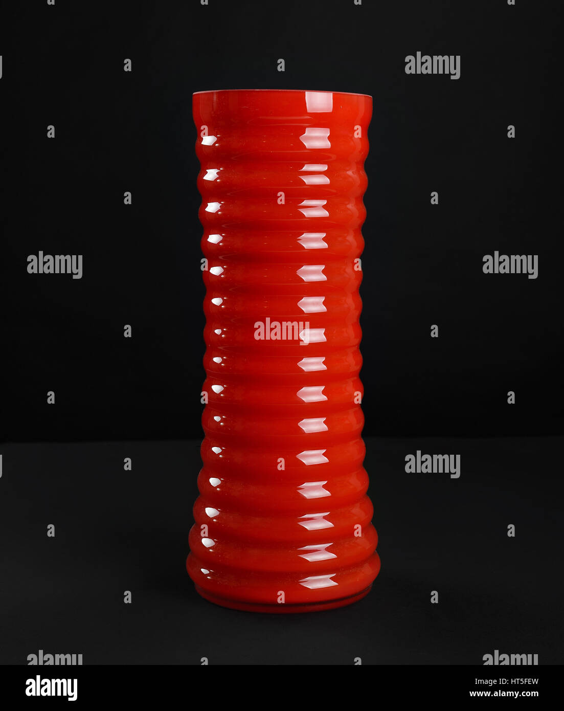 Modern red glass vase, front view Stock Photo - Alamy