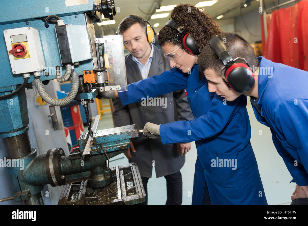 Worker using bench drill hi-res stock photography and images - Alamy