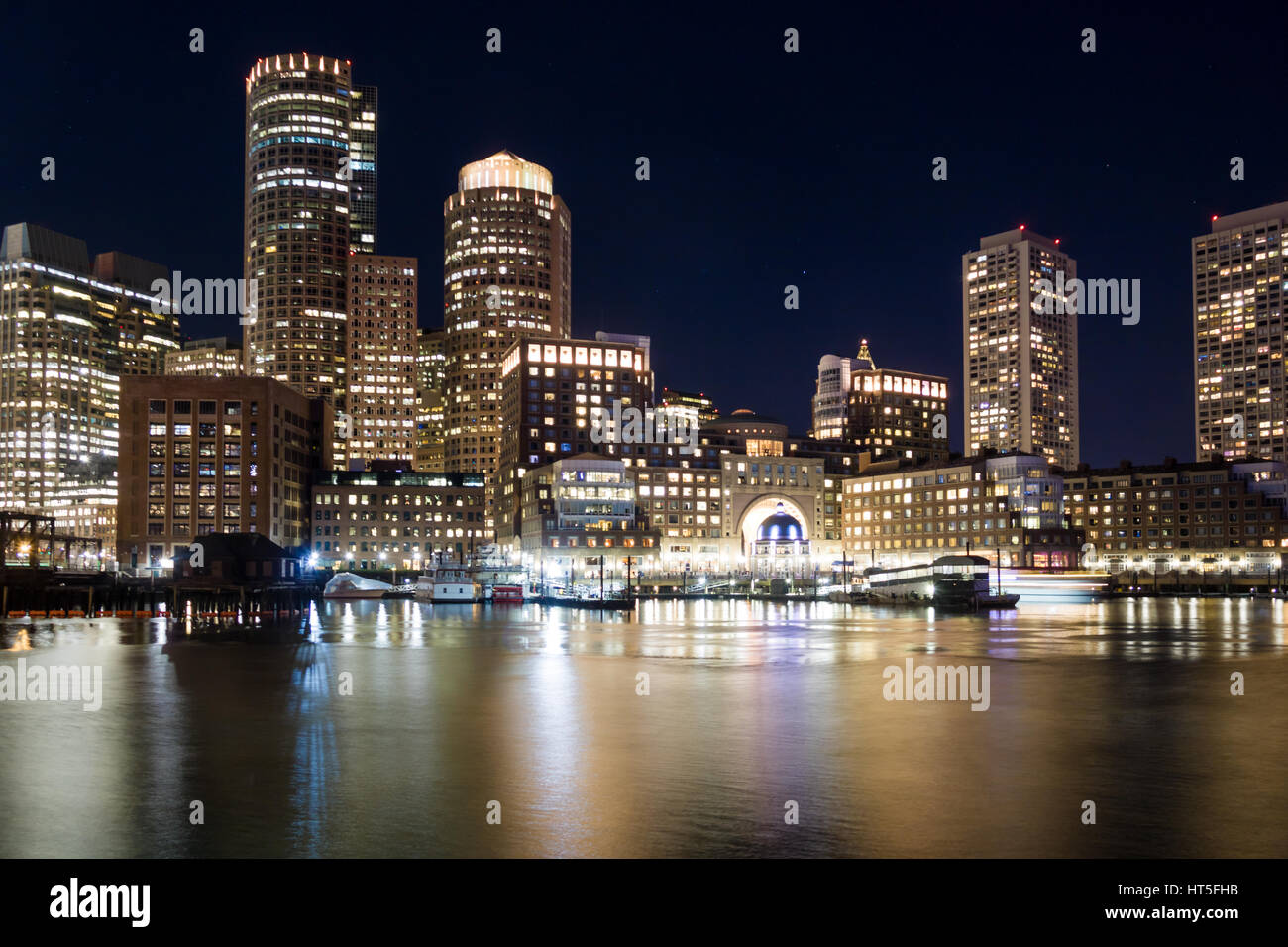 Boston Harbor and Financial District skyline at night - Boston ...