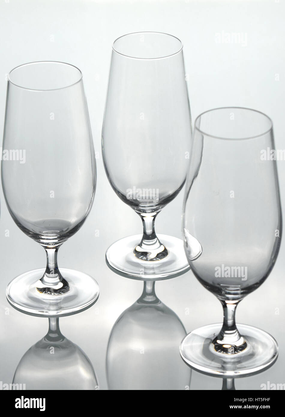 Set of three empty water glasses, isolated on white background Stock ...