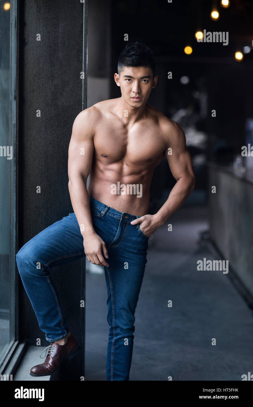 Portrait of young muscular man Stock Photo - Alamy