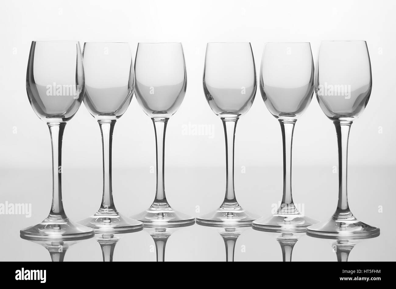 Set of six empty glasses, isolated on white background Stock Photo - Alamy