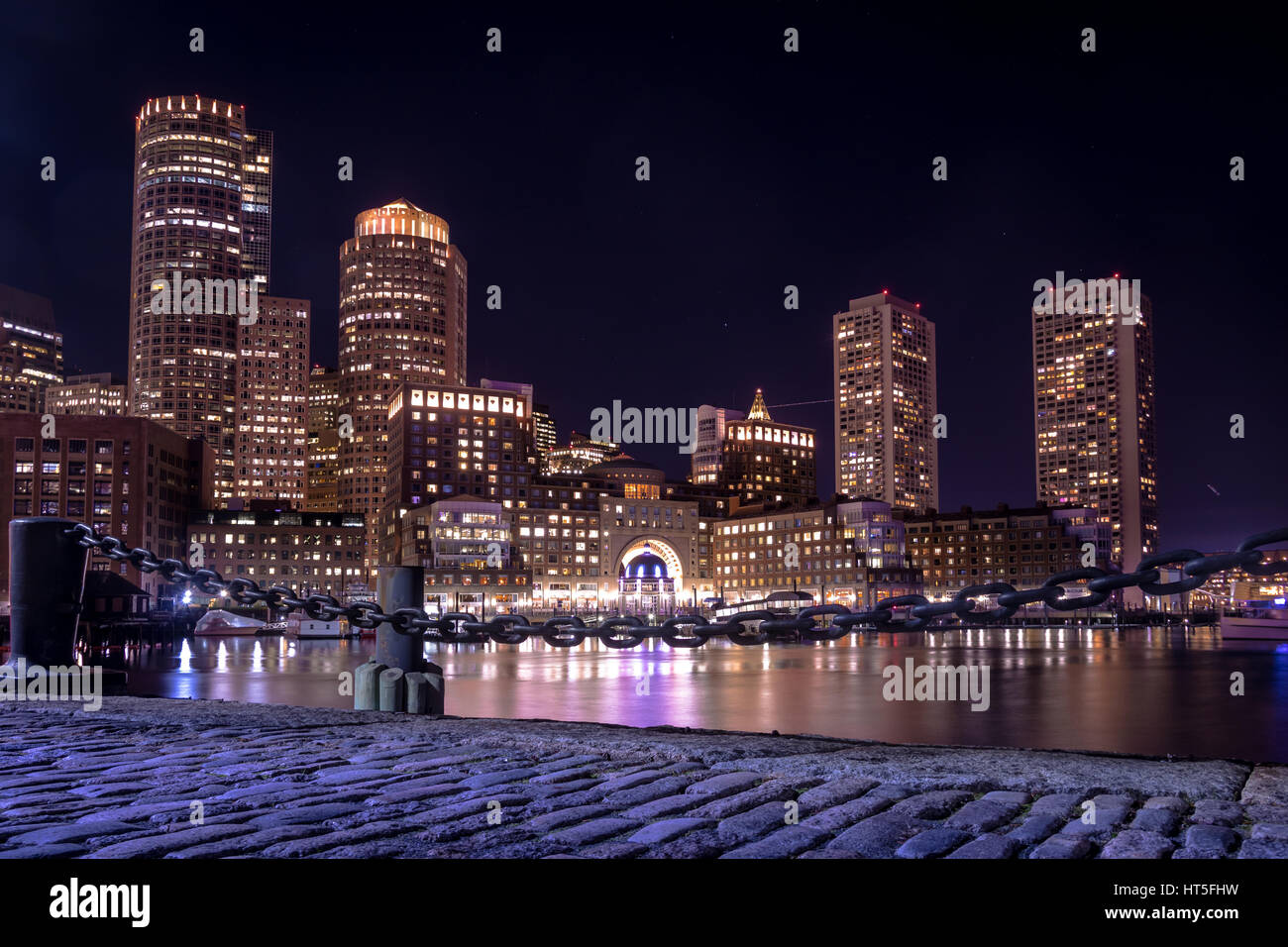 Boston Harbor and Financial District skyline at night - Boston ...