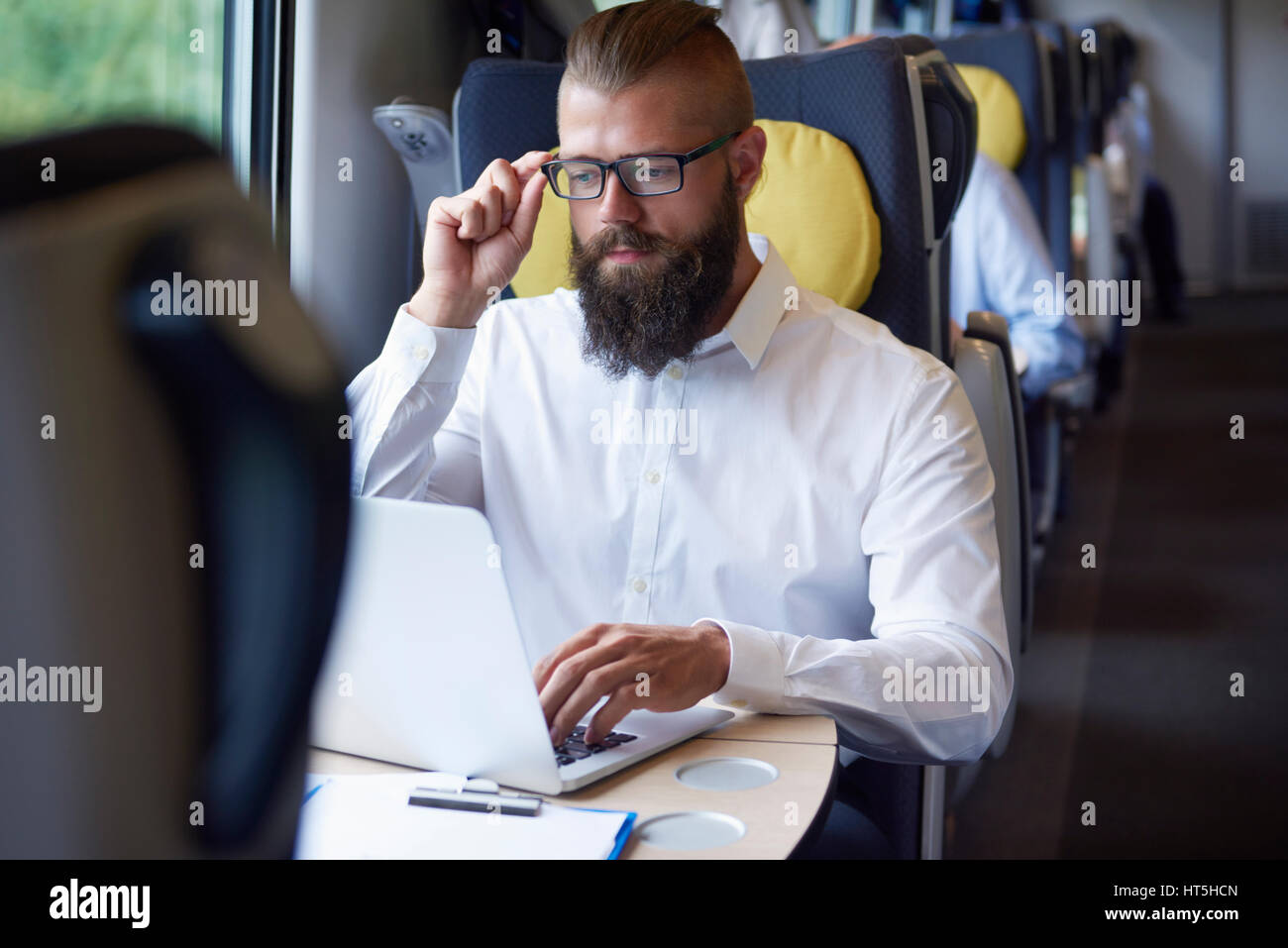 Business man working train hi-res stock photography and images - Alamy