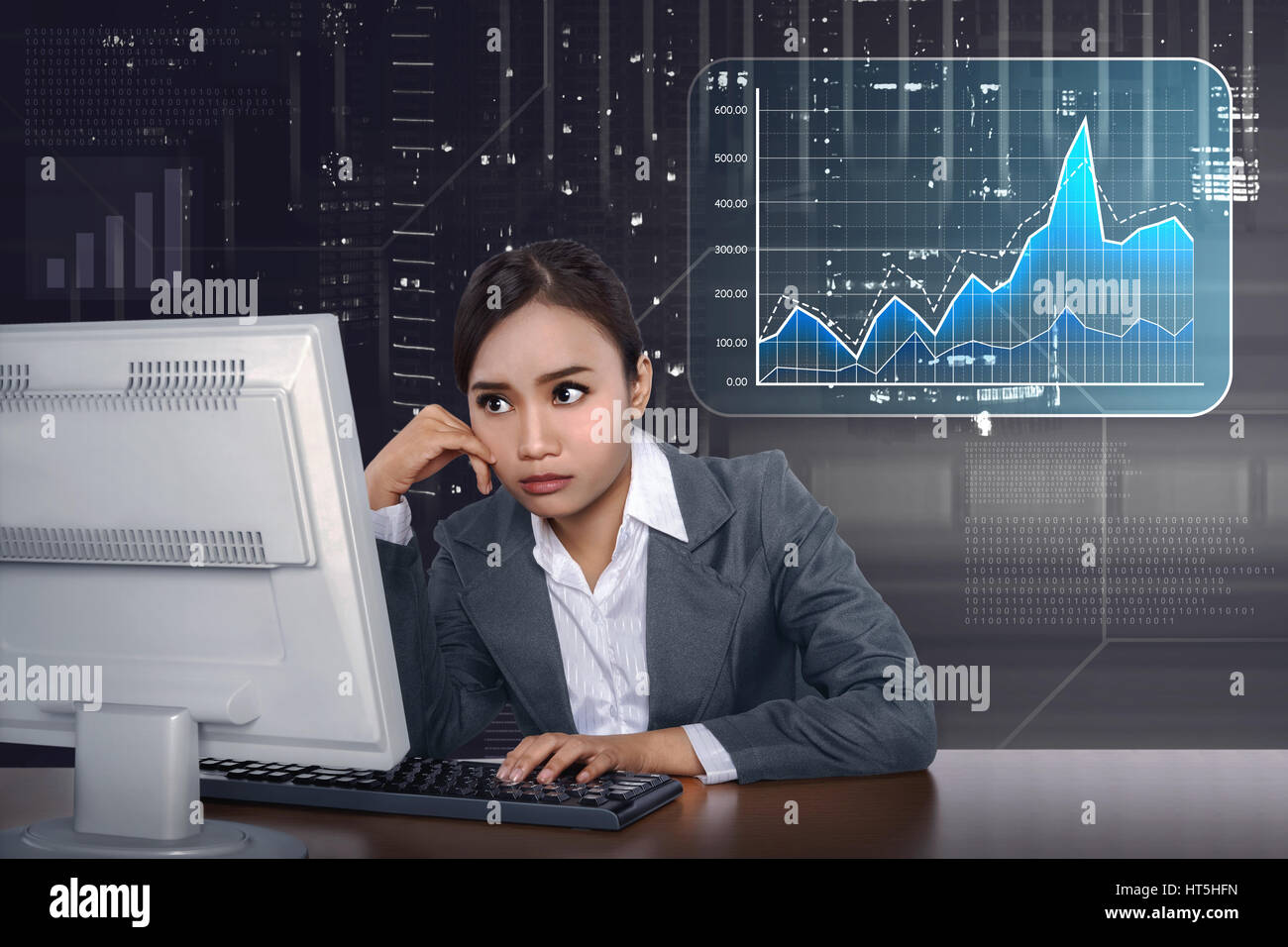 Asian business woman working with computer with virtual market chart on ...