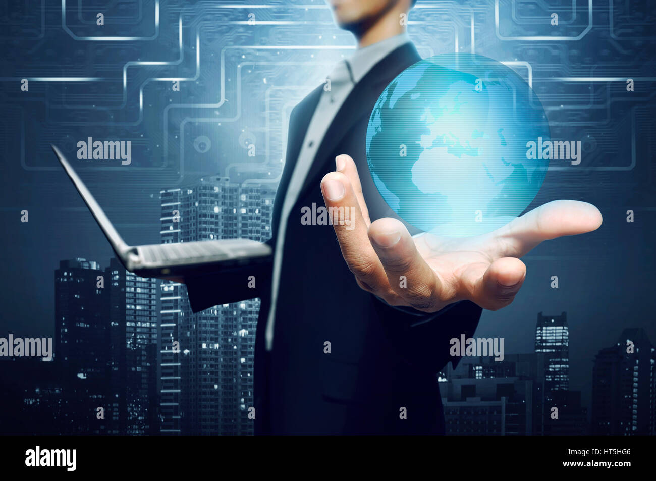 Business man give the hand for help using laptop. Technology concept ...