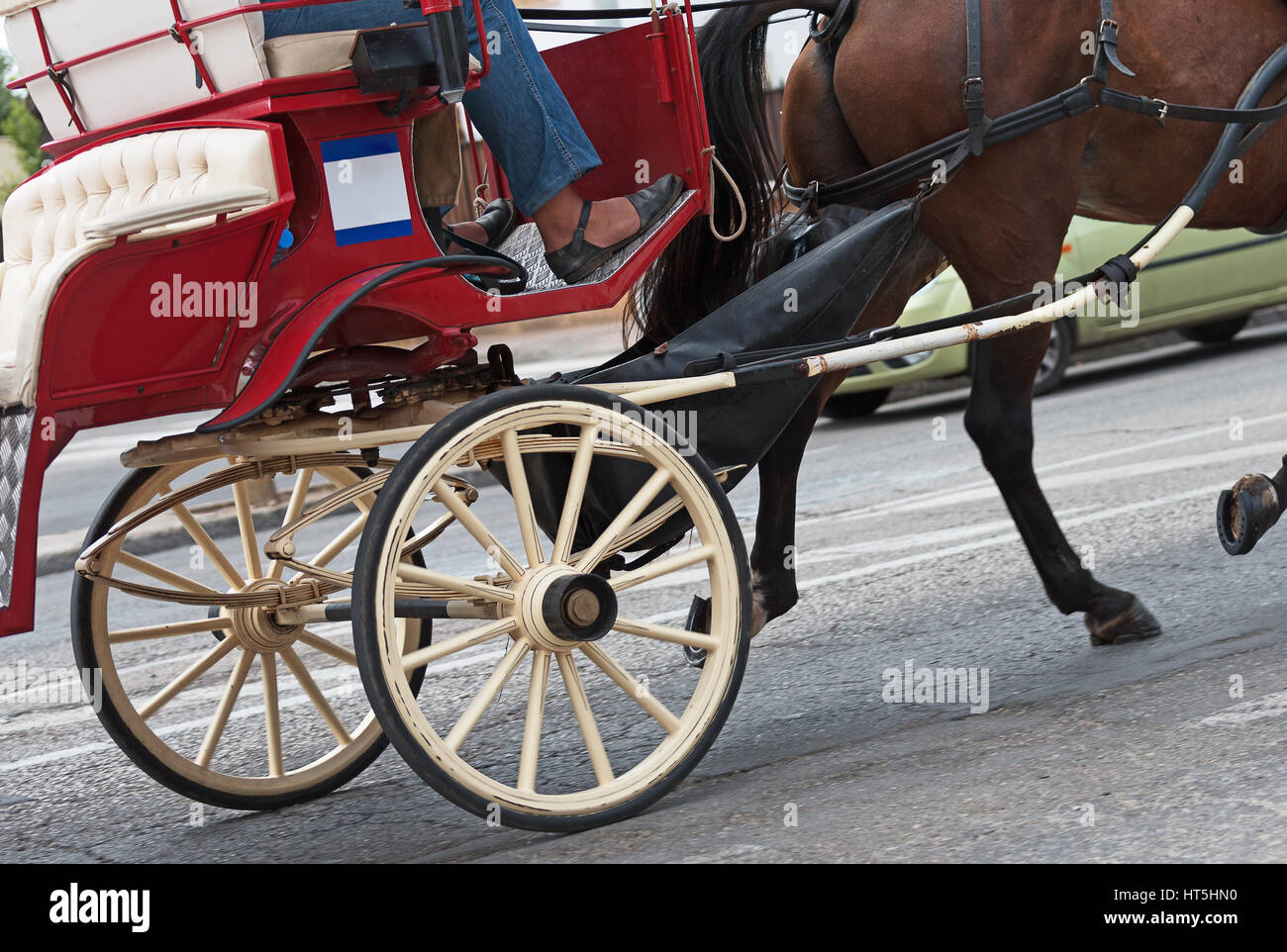 Horse-drawn carriage running in the old town Stock Photo - Alamy
