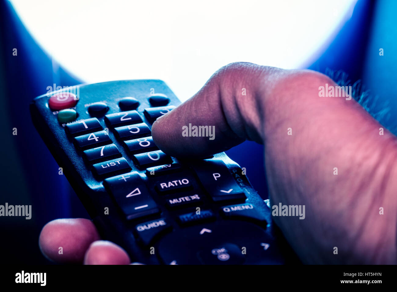 remote control in hand Stock Photo - Alamy