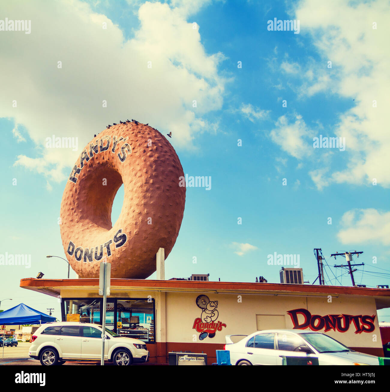 American donut shop sign hi-res stock photography and images - Alamy