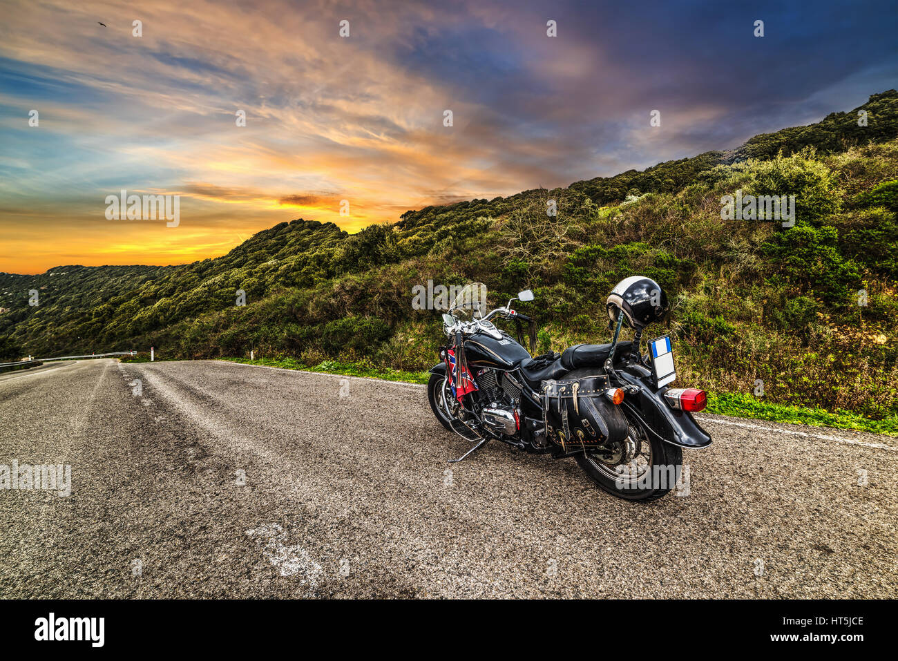 Classic motorcycle on the edge of a country road Stock Photo - Alamy