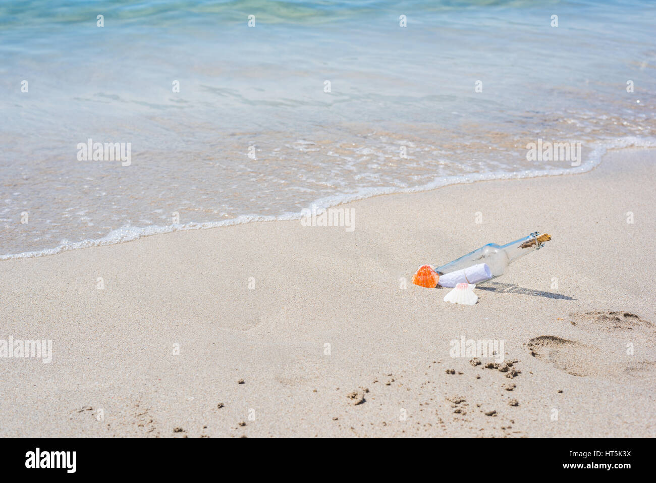 Message in a bottle by the sea Stock Photo - Alamy