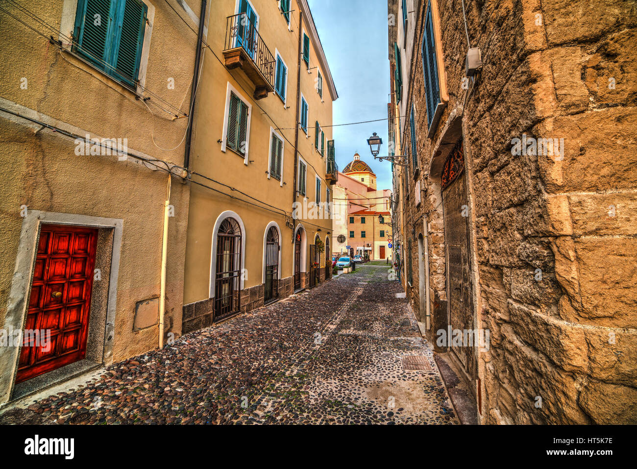 Narrow street in Alghero old town, Sardinia Stock Photo - Alamy