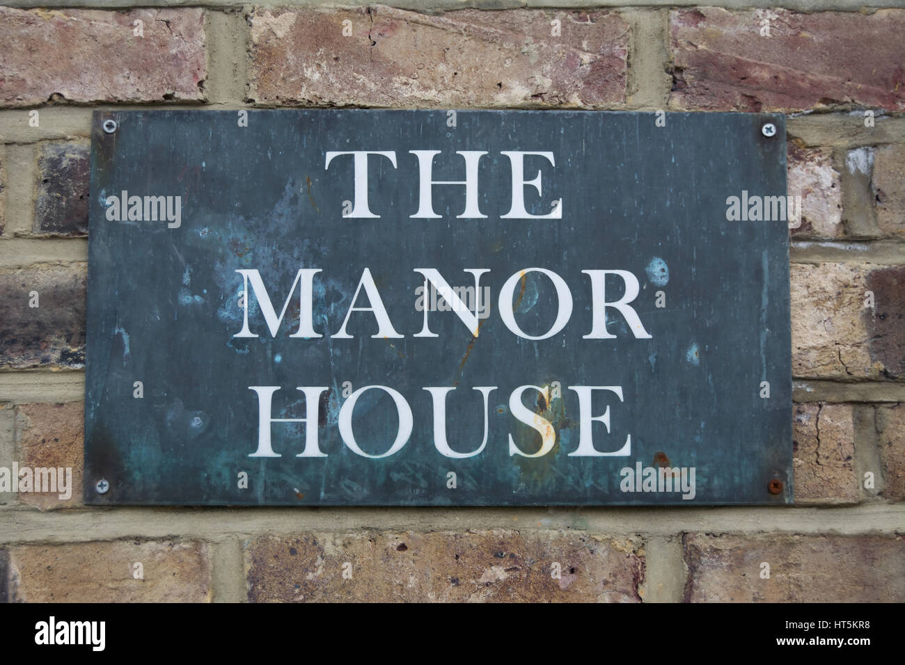wall sign for the manor house, ham, surrey, england Stock Photo - Alamy
