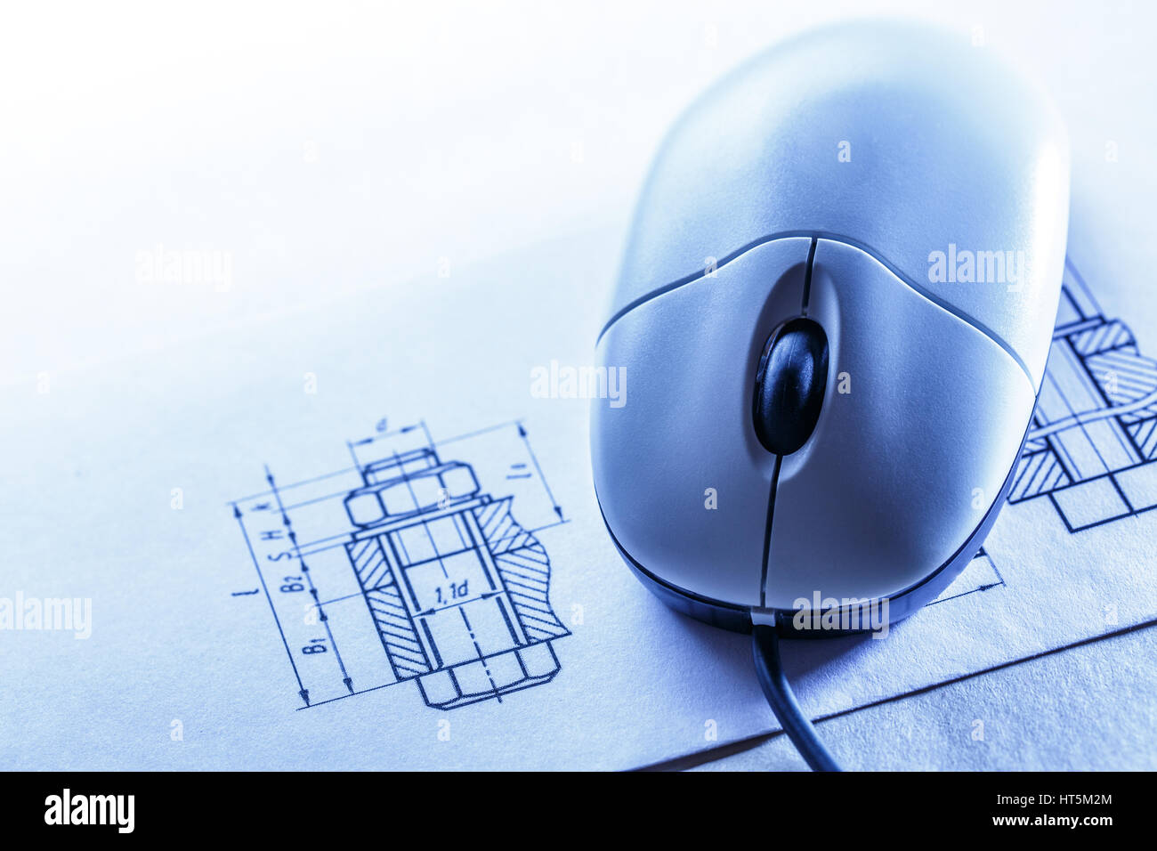 Drafting and computer mouse in toning closeup Stock Photo - Alamy