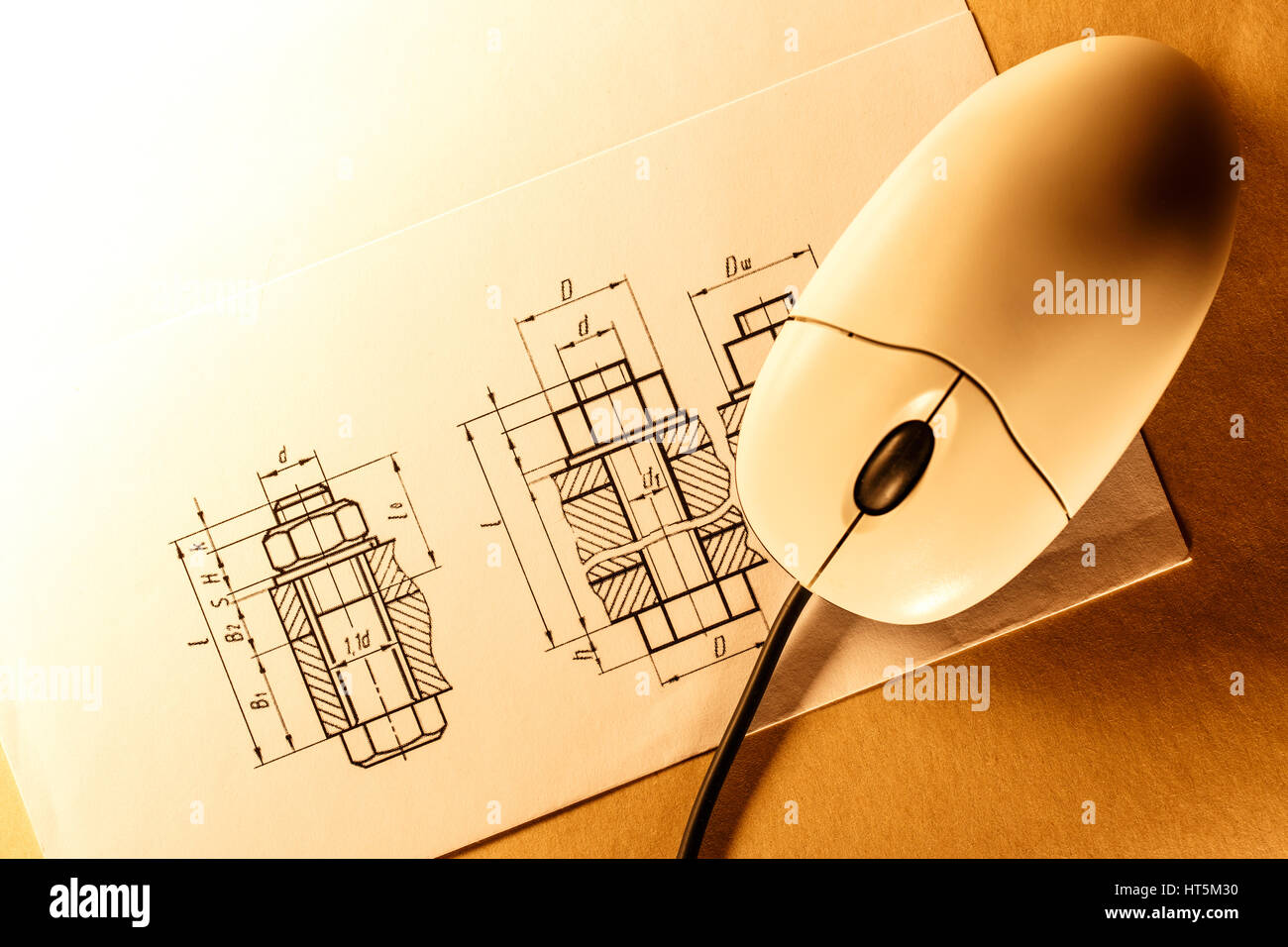 Drafting and computer mouse in toning closeup Stock Photo - Alamy