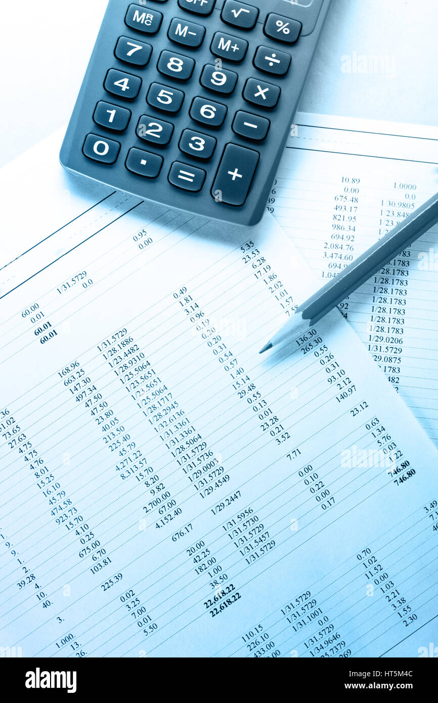 Operating budget, calculator and pencil in closeup Stock Photo - Alamy