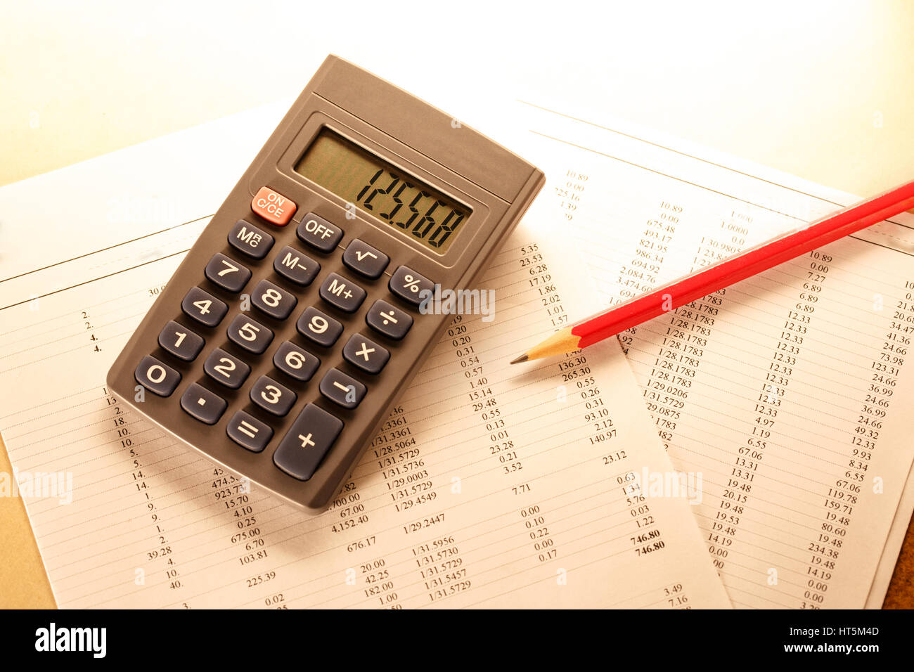 Operating budget, calculator and pencil in closeup Stock Photo - Alamy