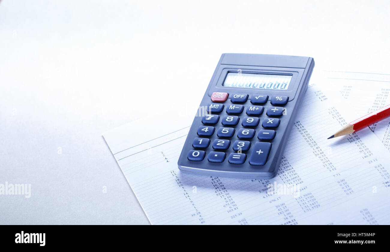 Operating budget, calculator and pencil in closeup Stock Photo - Alamy