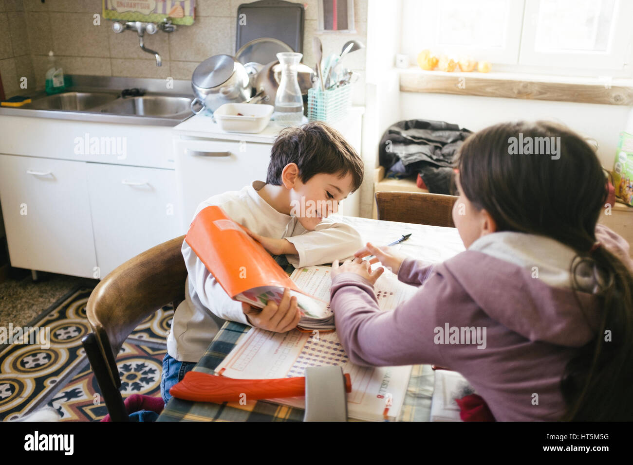 Children do homework Stock Photo - Alamy