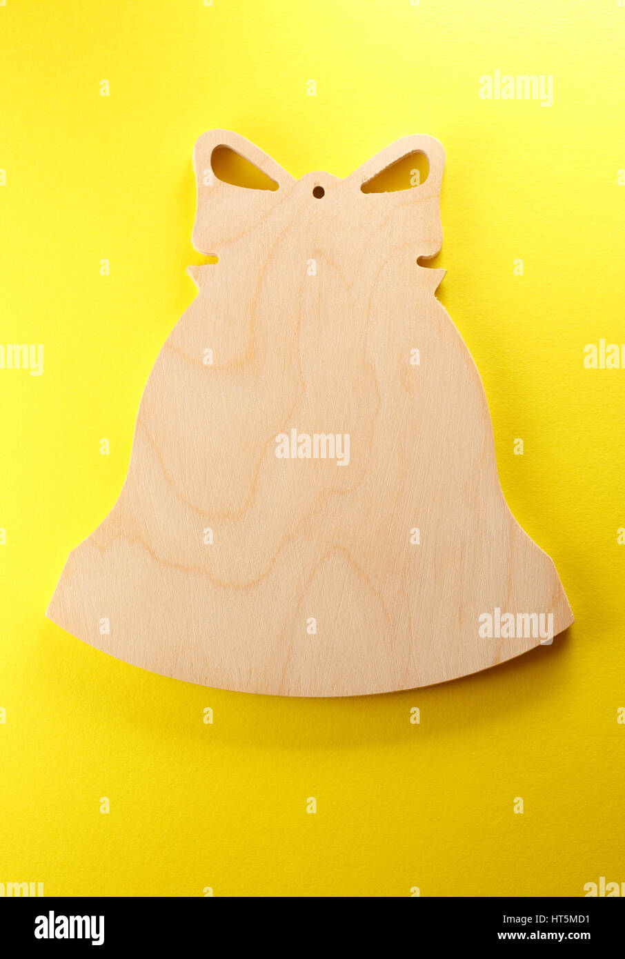 Blank wooden cutting board in bell form Stock Photo - Alamy