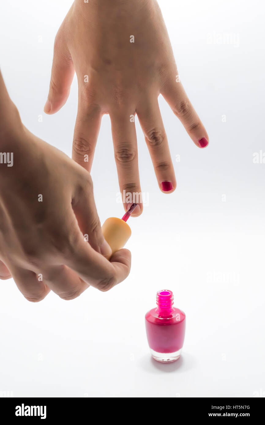 Fingernail painting for make up on white background Stock Photo - Alamy