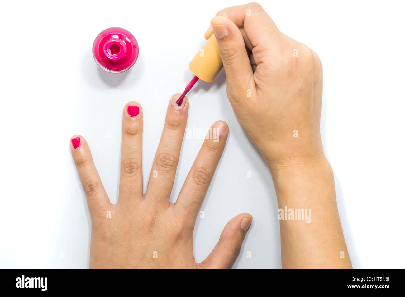Fingernail painting for make up on white background Stock Photo - Alamy