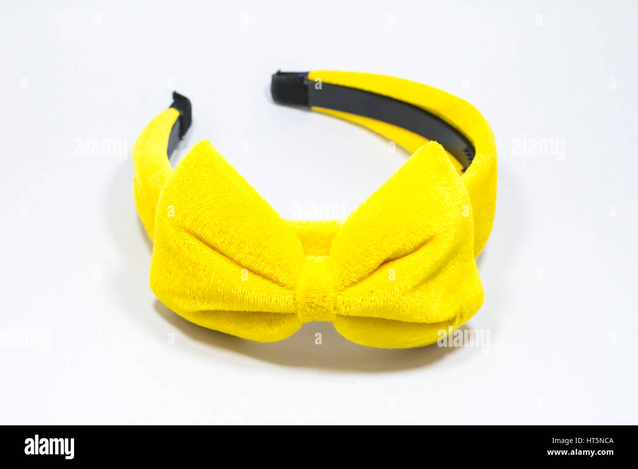 A cute yellow headband isolated on white background Stock Photo - Alamy