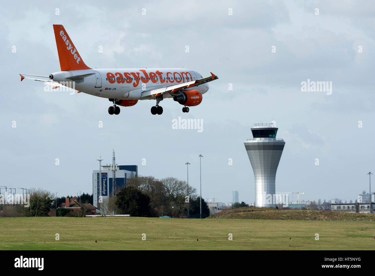Easyjet Airbus A319 landing at Birmingham Airport, UK (HB-JYH Stock ...