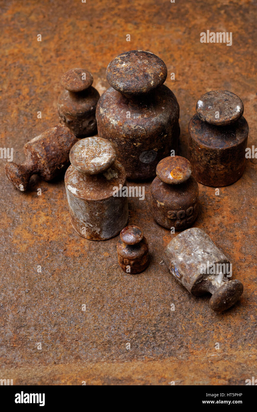 Backgrounds and textures: group of very old and rusty weights for ...